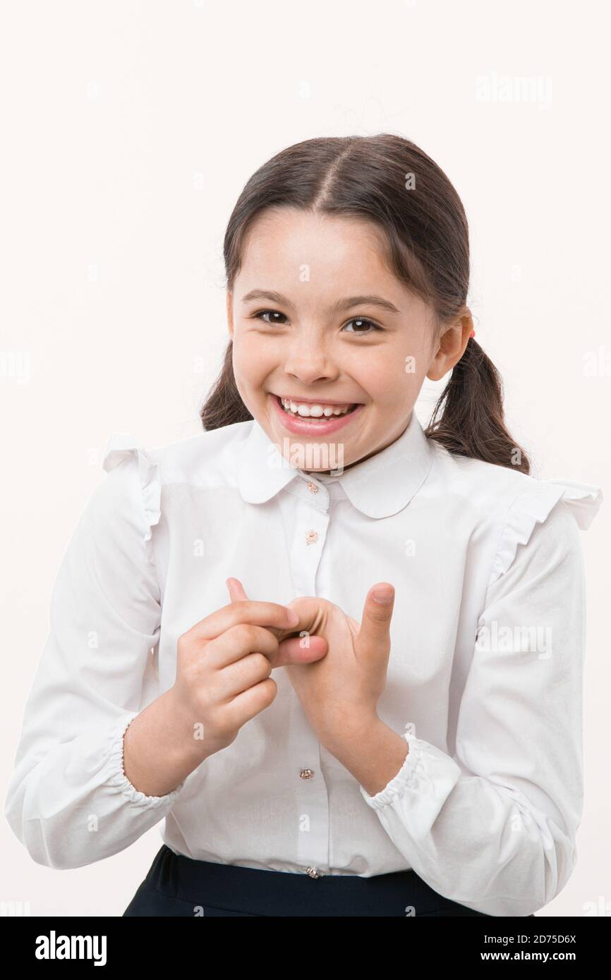 Girl counting on fingers. First of all. Girl school uniform smiling ...