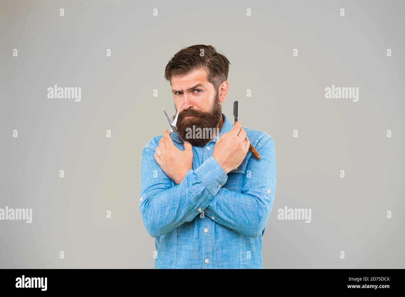 Shaving with a real blade sounds cool. Bearded man prepare shaving ...