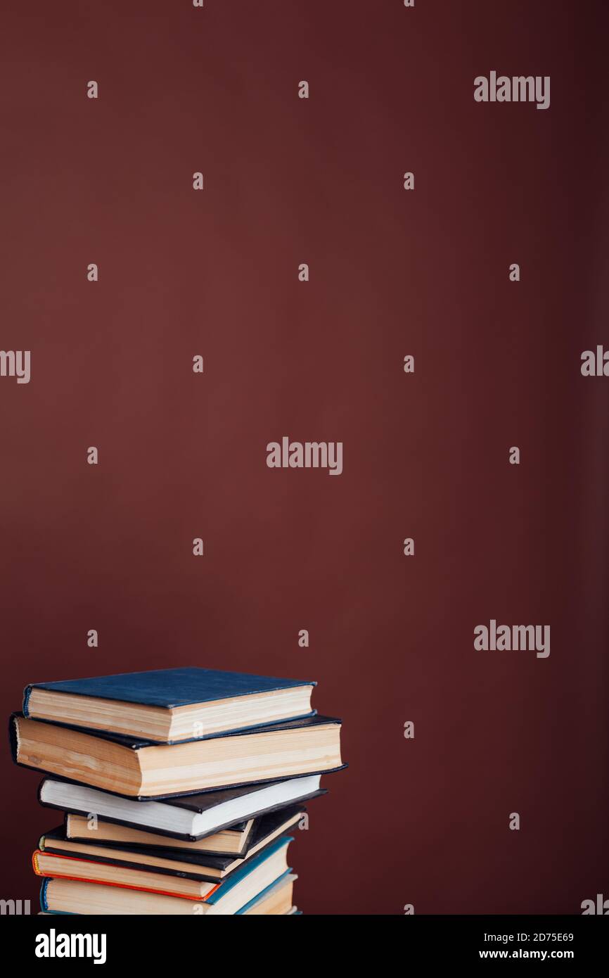 stacks of books for education knowledge in the school library on a ...