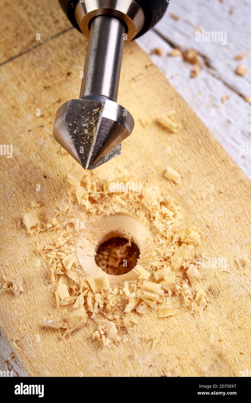 Drilling in wood with steel drills and countersinks. Minor carpentry ...