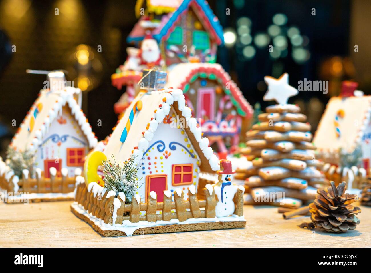 gingerbread house and gingerbread christmas decoration in the snow ...