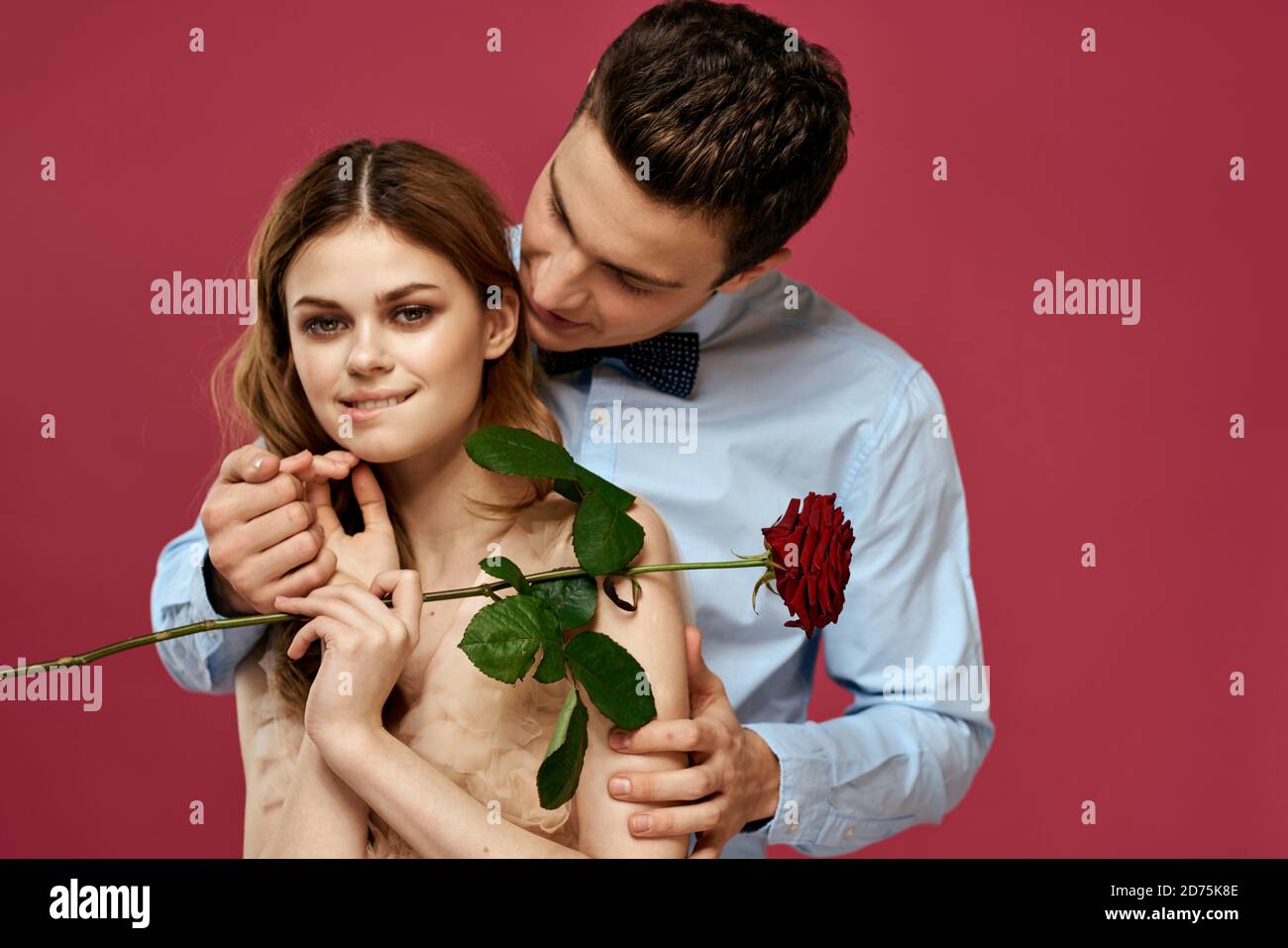 married couple man and woman romance red rose isolated background ...