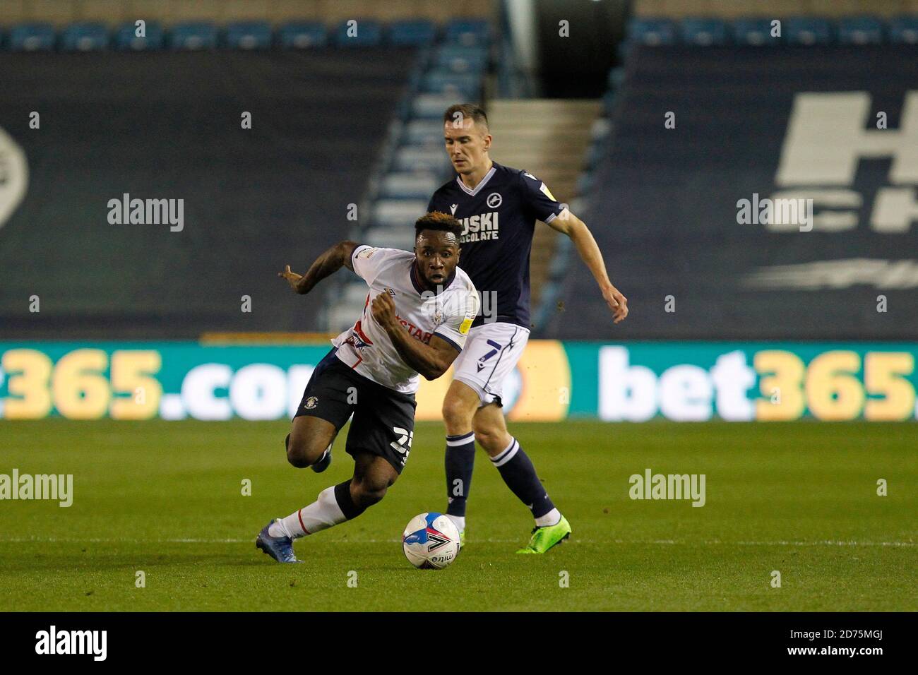 London, UK. 20th Oct, 2020. Kazenga LuaLua of Luton Town beats Jed ...