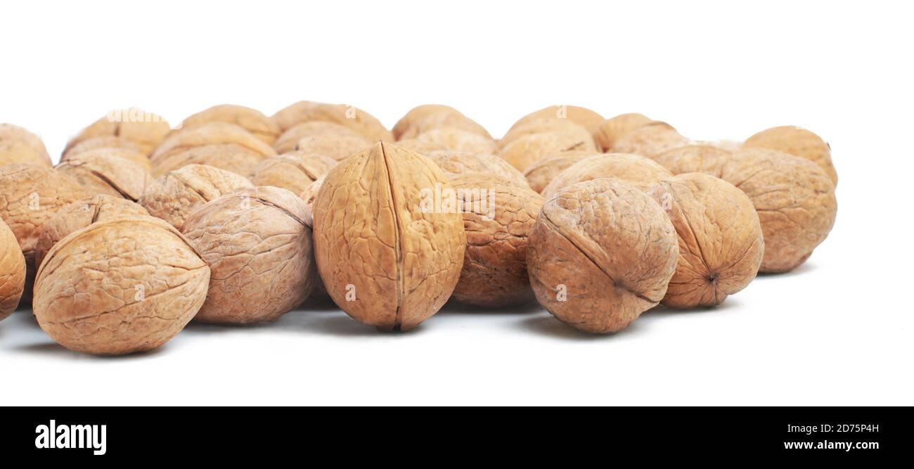 Fresh walnut Isolate on a white background. Group. Side view Stock ...