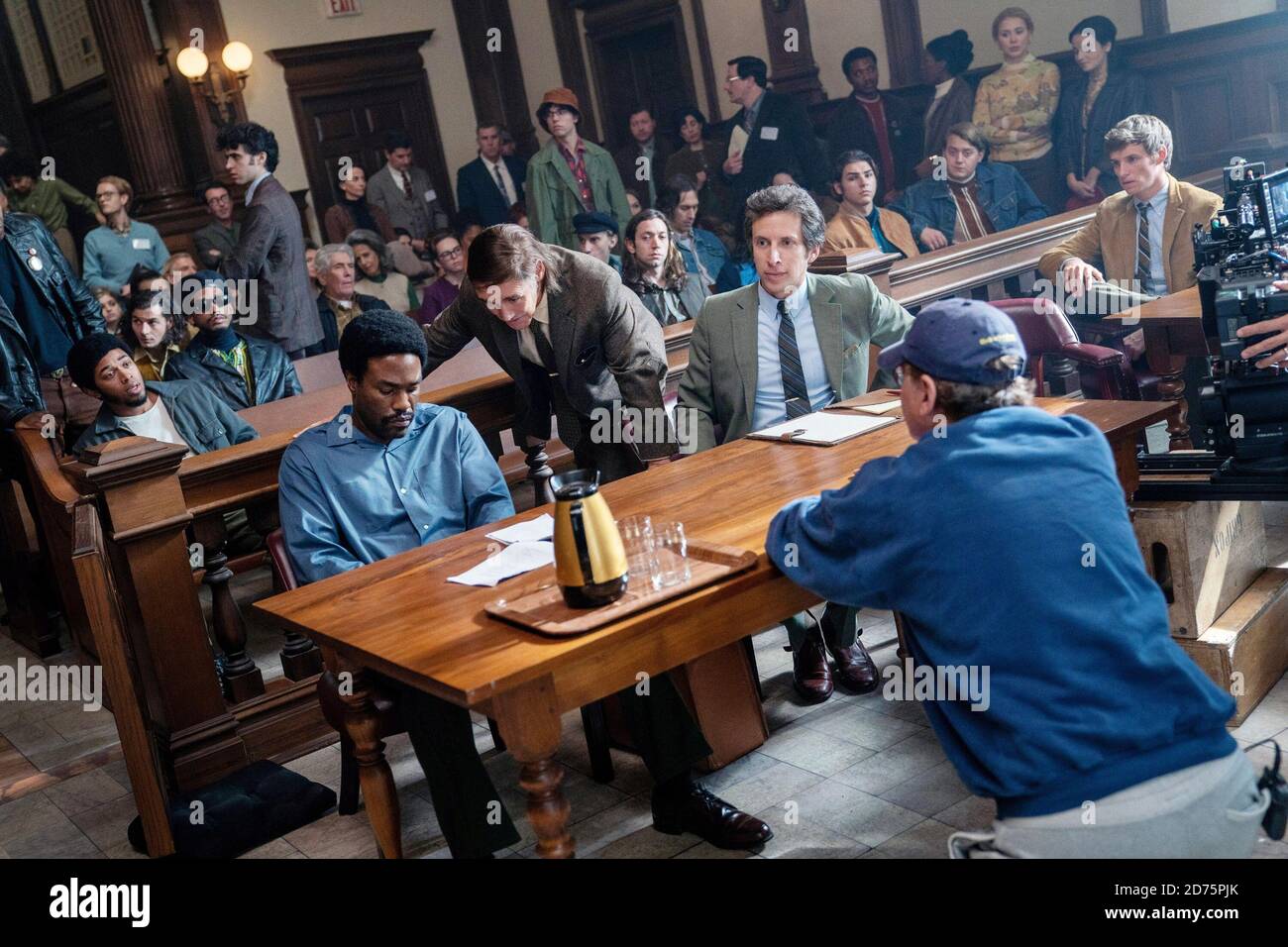 THE TRIAL OF THE CHICAGO 7, at table from left: Yahya Abdul-Mateen II ...