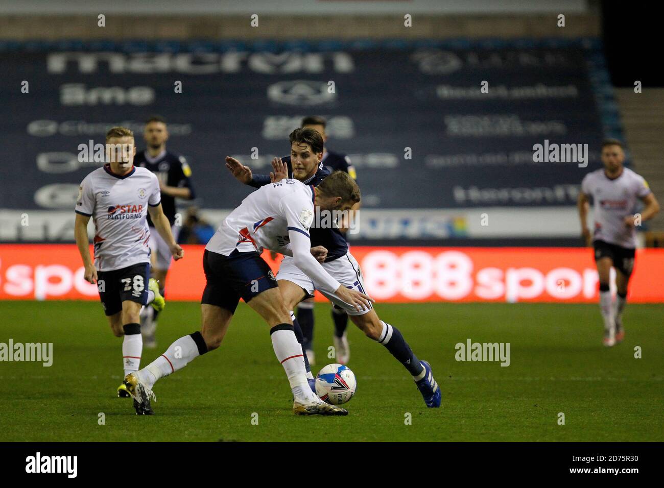 London, UK. 20th Oct, 2020. Connor Mahoney of Millwall and Martin ...
