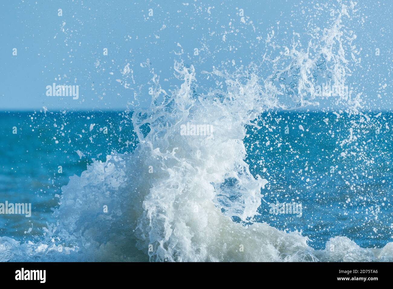 Wave of the sea water at sunny day time Stock Photo - Alamy