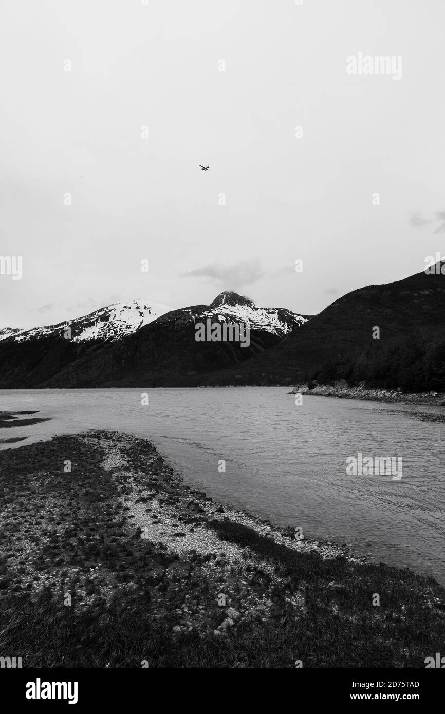 Vertical grayscale shot of lake glaciers and mountains in Alaska Stock ...