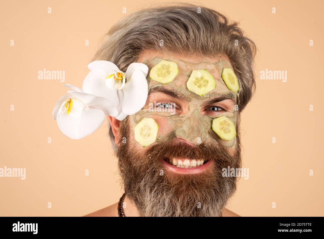 Closeup man face care. Funny man with facial cream whith cucumber Stock ...