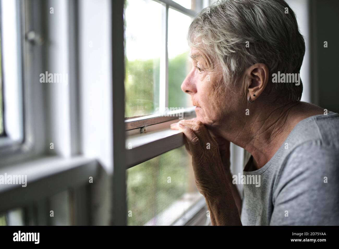 A worried senior woman at home felling very bad Stock Photo - Alamy