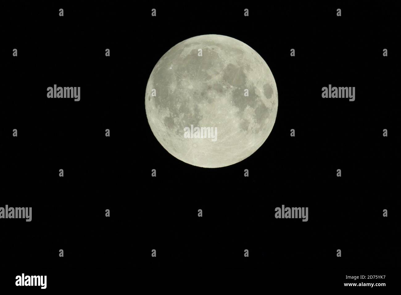 View of a bright full moon isolated on a dark background Stock Photo ...