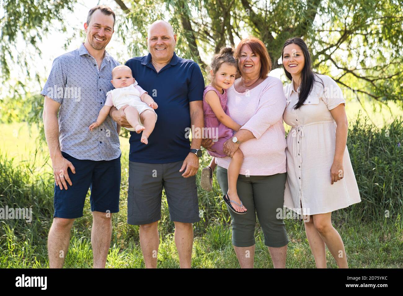 family relaxing together in nature with grandparent Stock Photo - Alamy