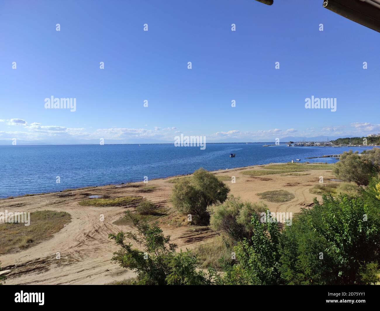 Beautiful view of a calm sea during a high sunny day with a clear sky ...