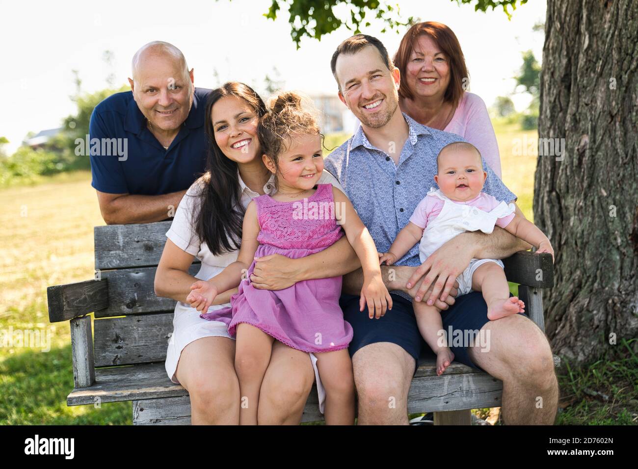 family relaxing together in nature with grandparent Stock Photo - Alamy