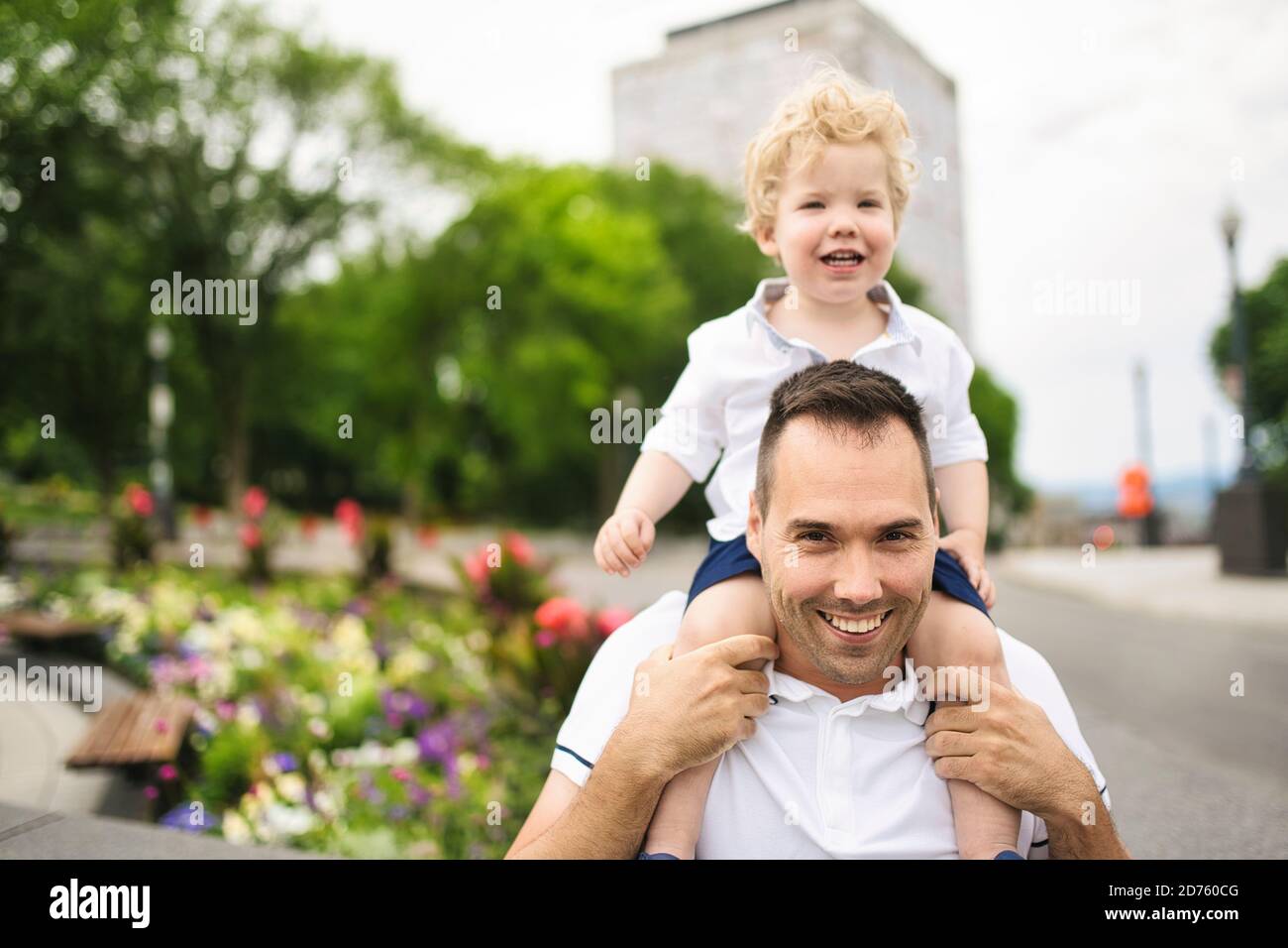 father and his cute baby boy having fun outdoors Stock Photo - Alamy