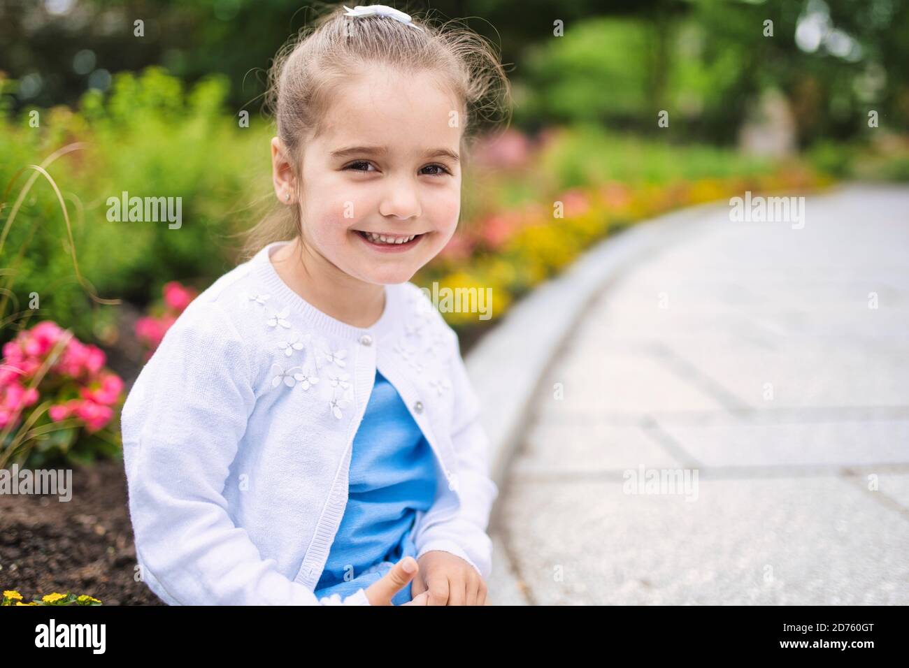 cute Portrait of a nice little girl outside Stock Photo - Alamy