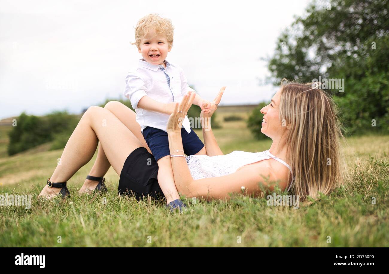 Happiness mother with her baby son on the day time Stock Photo - Alamy