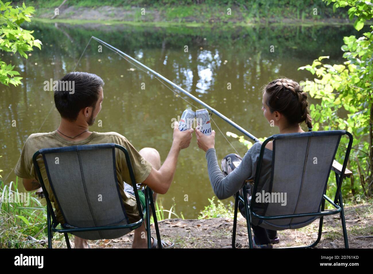 KHARKOV, UKRAINE - AUGUST 22 2020: Boy and girl cheers with Budweiser ...