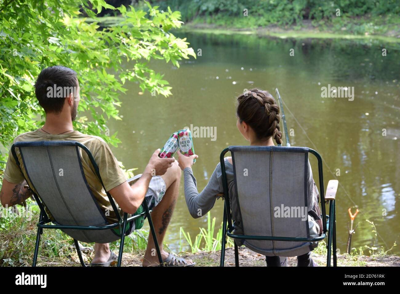 KHARKOV, UKRAINE - AUGUST 22 2020: Boy and girl cheers with Budweiser ...