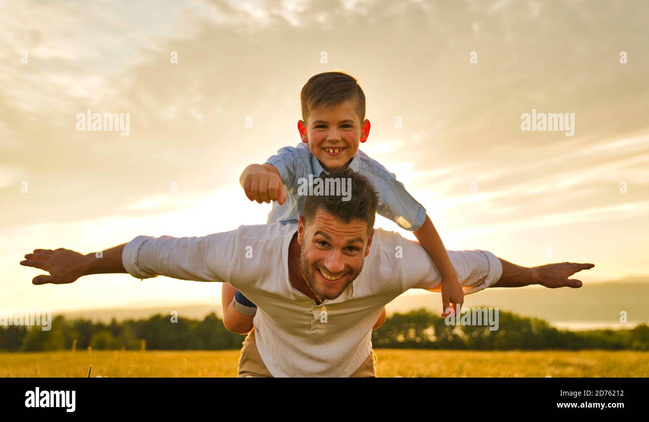 Father hand son shoulder hi-res stock photography and images - Alamy