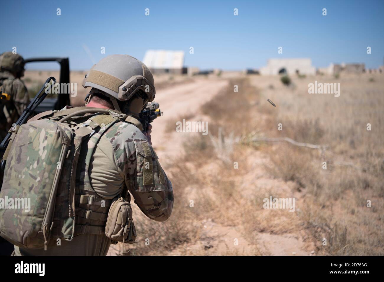 A 3rd Air Support Operations Group Airman lays down suppressing fire ...