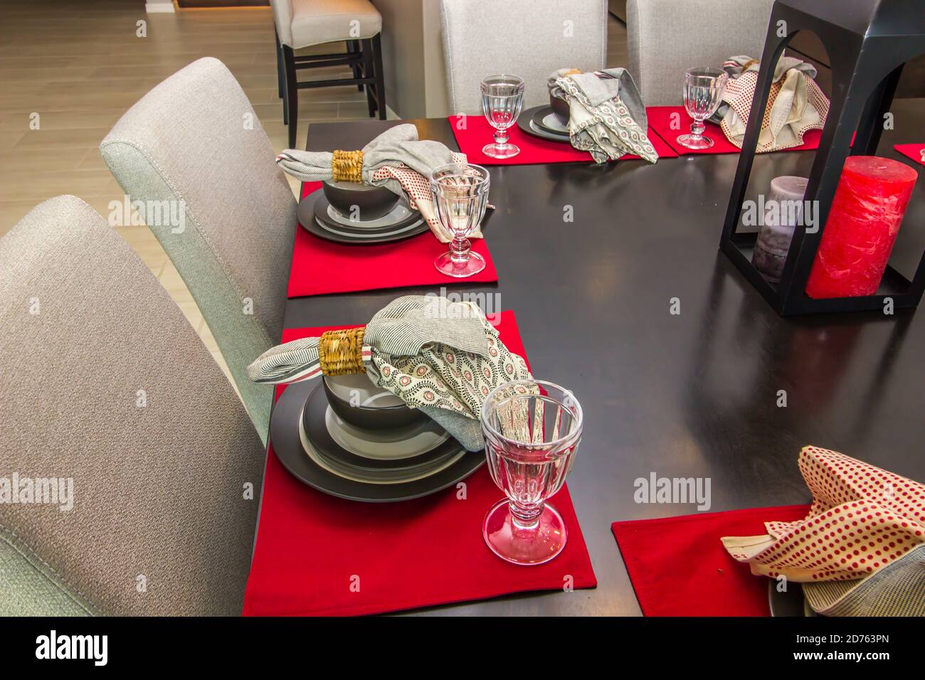 Color Place Settings On Dining Room Table Stock Photo - Alamy