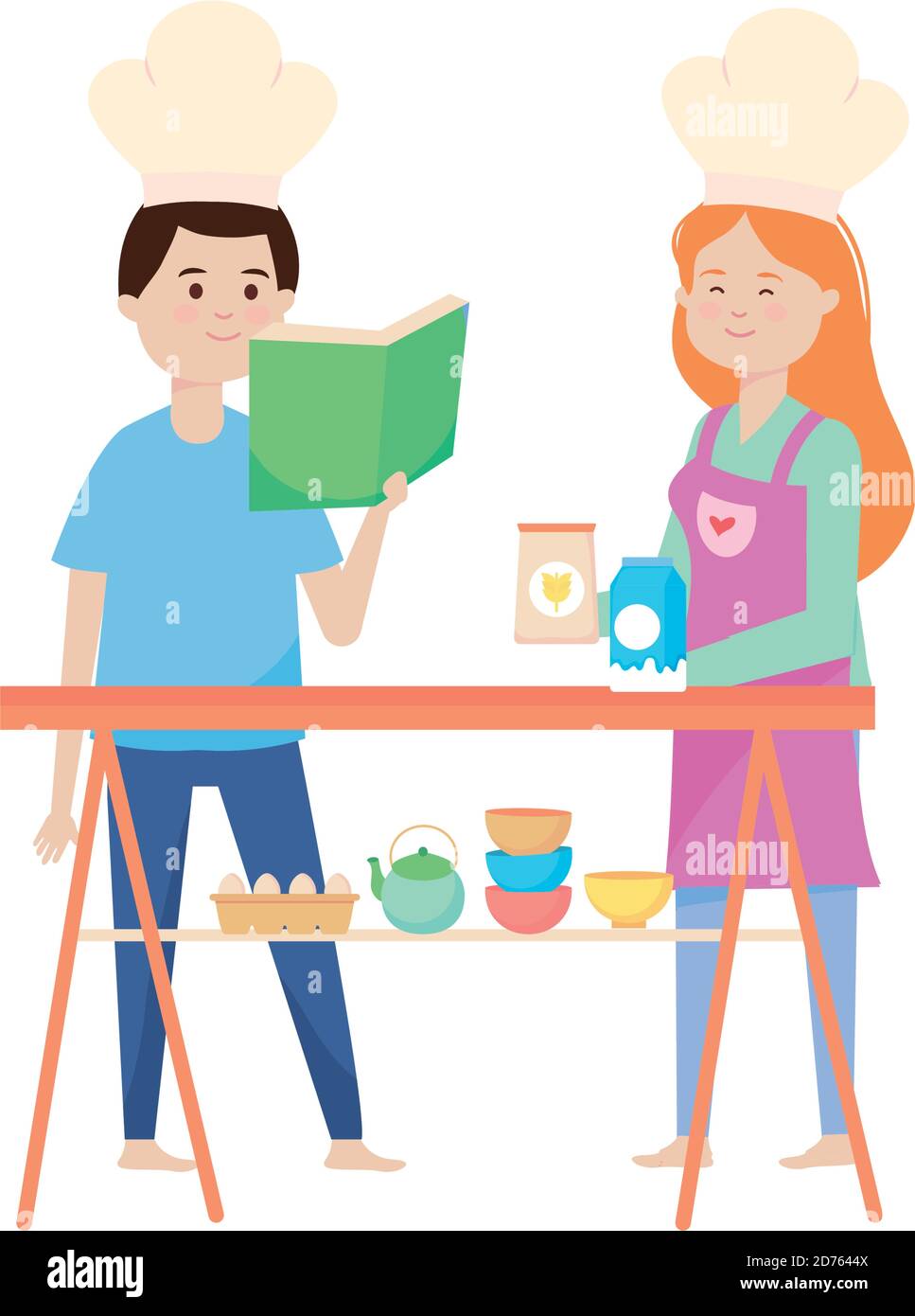 young couple reading recipes book and preparing food in the kitchen ...