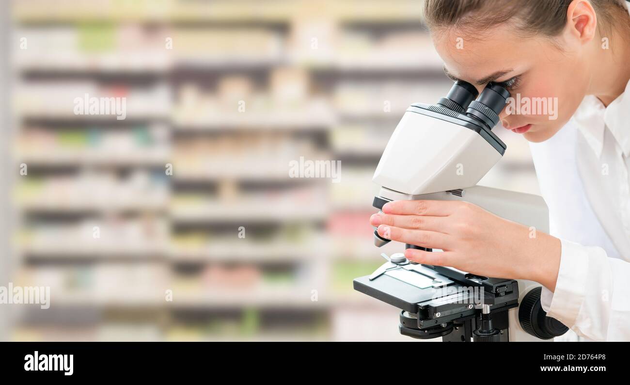 Scientist researcher using microscope in laboratory. Medical healthcare ...