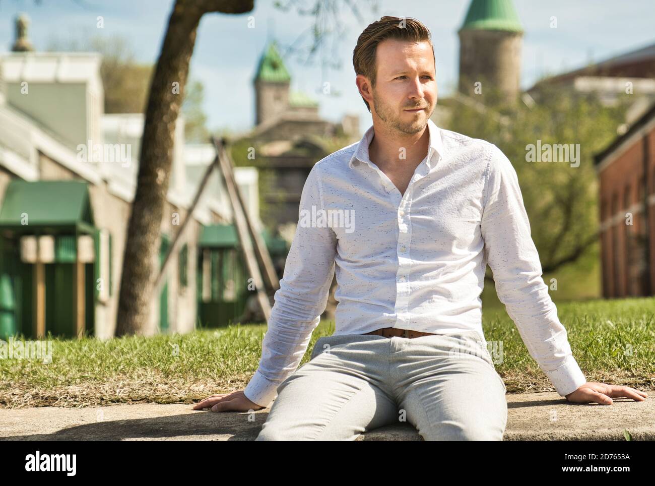 Portrait of an handsome man on the urban background Stock Photo - Alamy