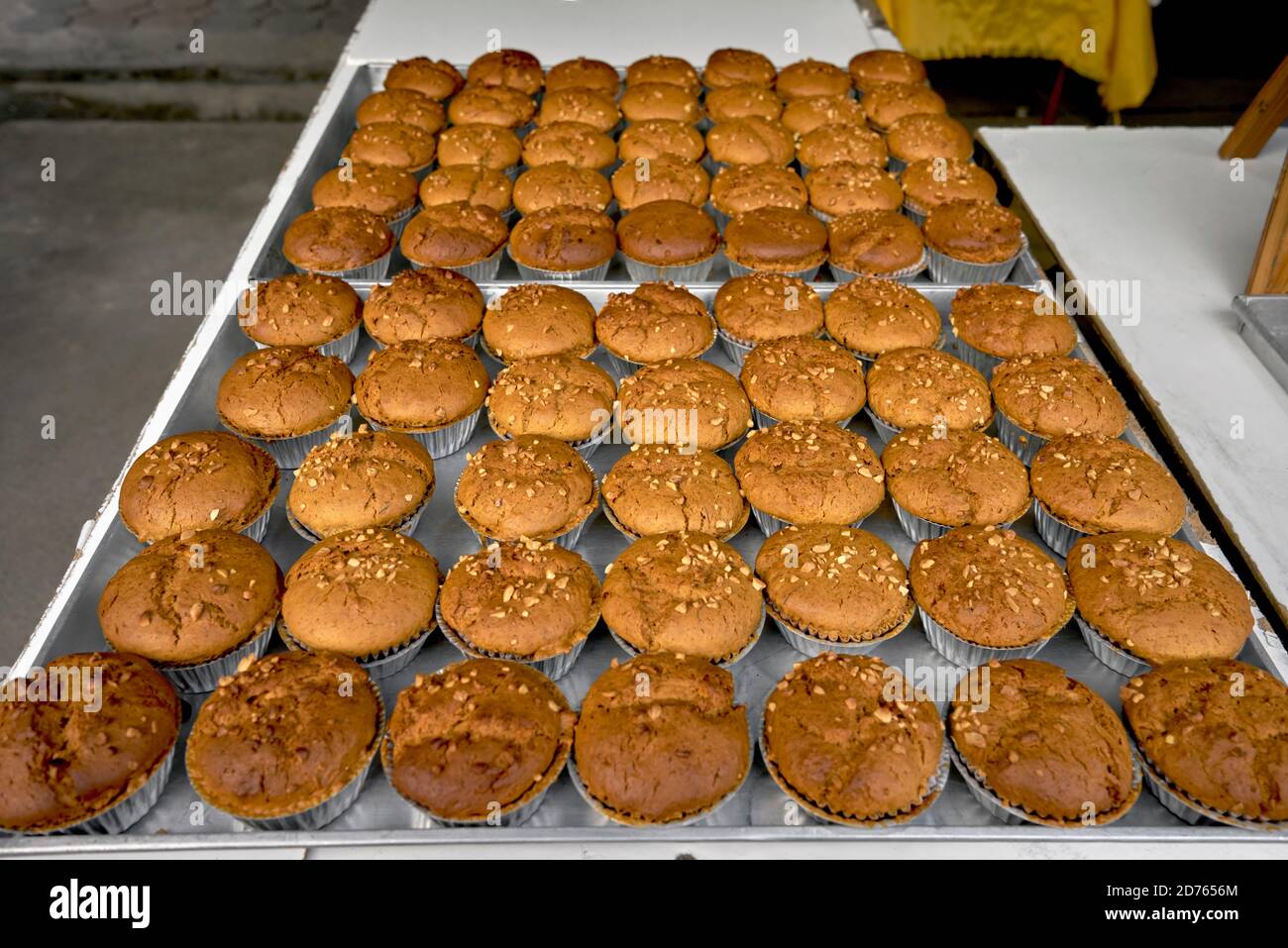 Cakes for sale. Freshly cooked cake presented on a tray at a street ...