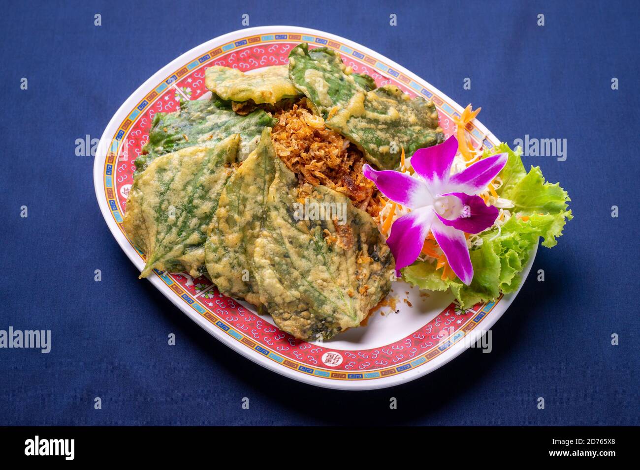 Crispy Shpoo Cha Plu Leaves, thai food Stock Photo - Alamy