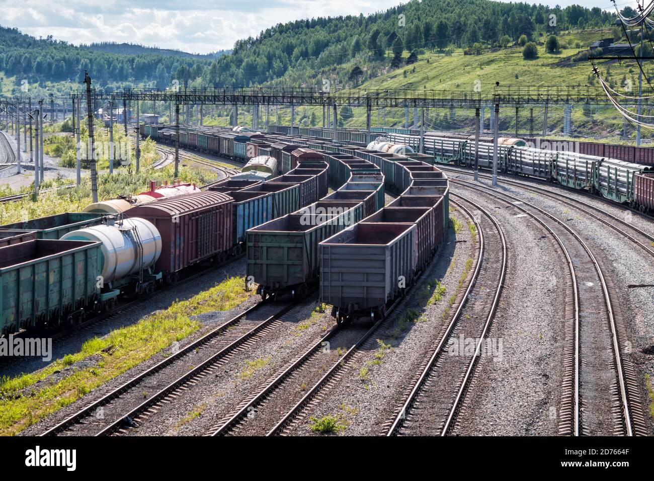 Freight railway carriages at the railroad station Stock Photo - Alamy
