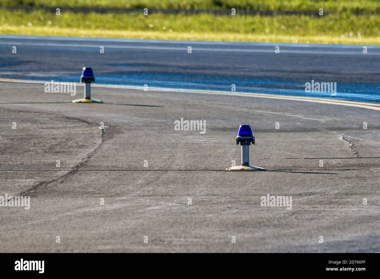 Taxiway, side row lights at the airport Stock Photo - Alamy