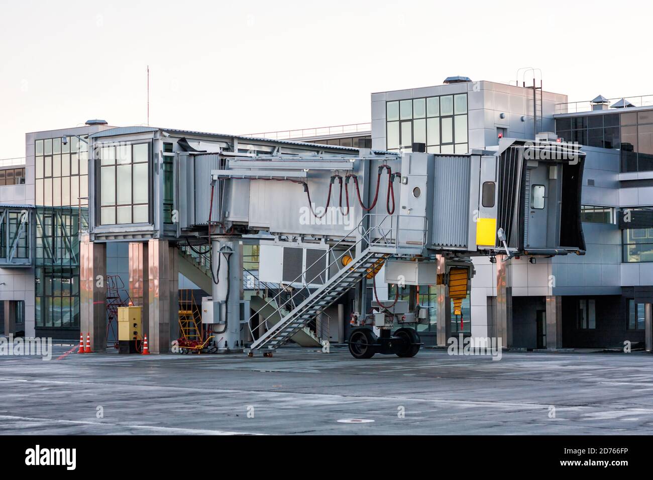 Empty jetway at the airport apron Stock Photo - Alamy