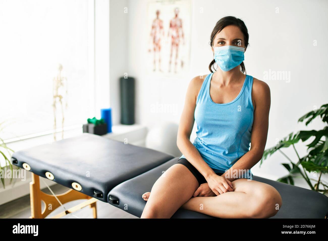 A Modern rehabilitation physiotherapy place with woman client Stock ...