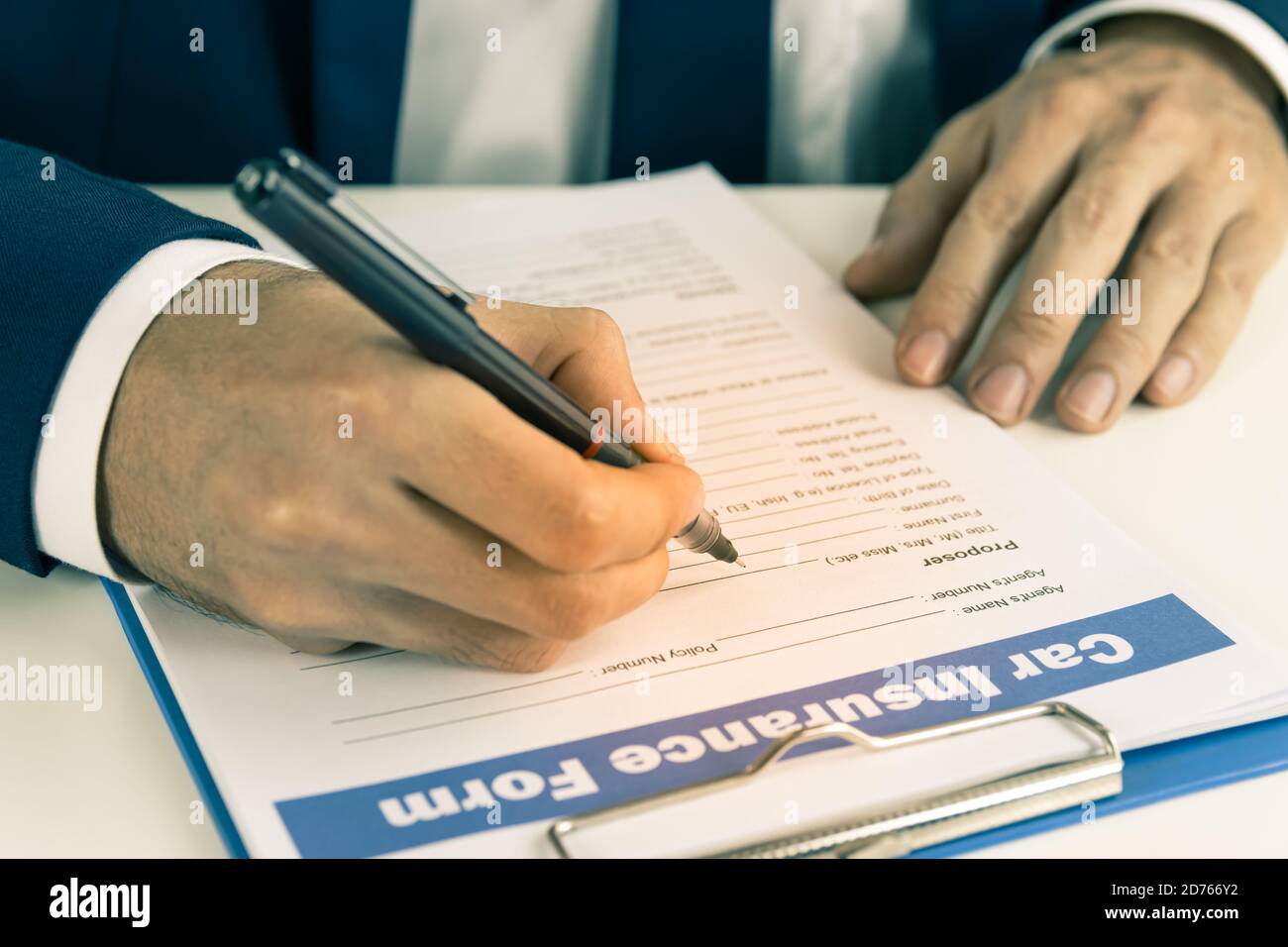 Zoom Insurance Agent Hand Writing Car Insurance Claim Form or Insurance ...