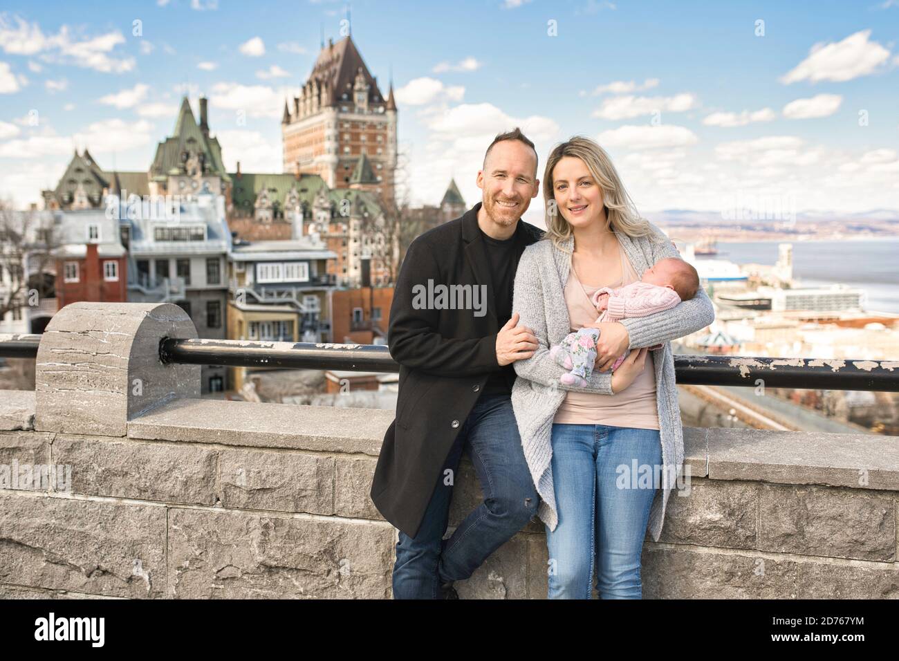 A Couple with baby in front of Chateau Frontenac at Quebec city Canada ...