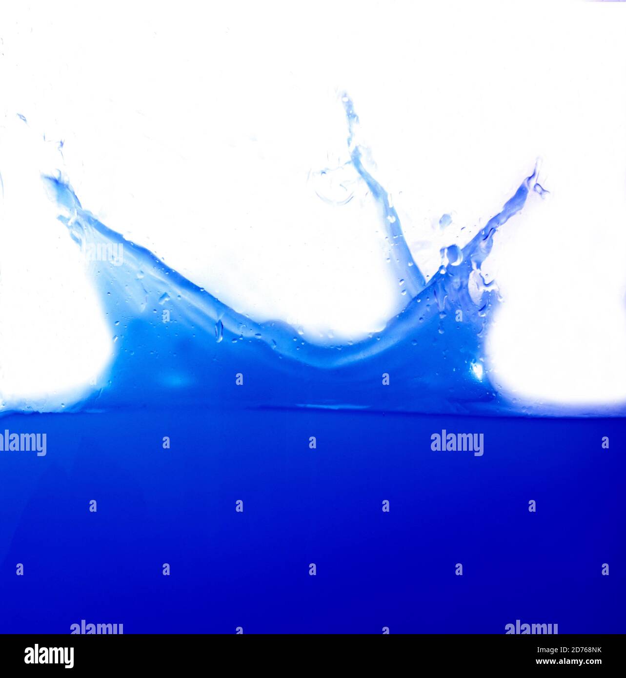 blue water splash on white background Stock Photo - Alamy