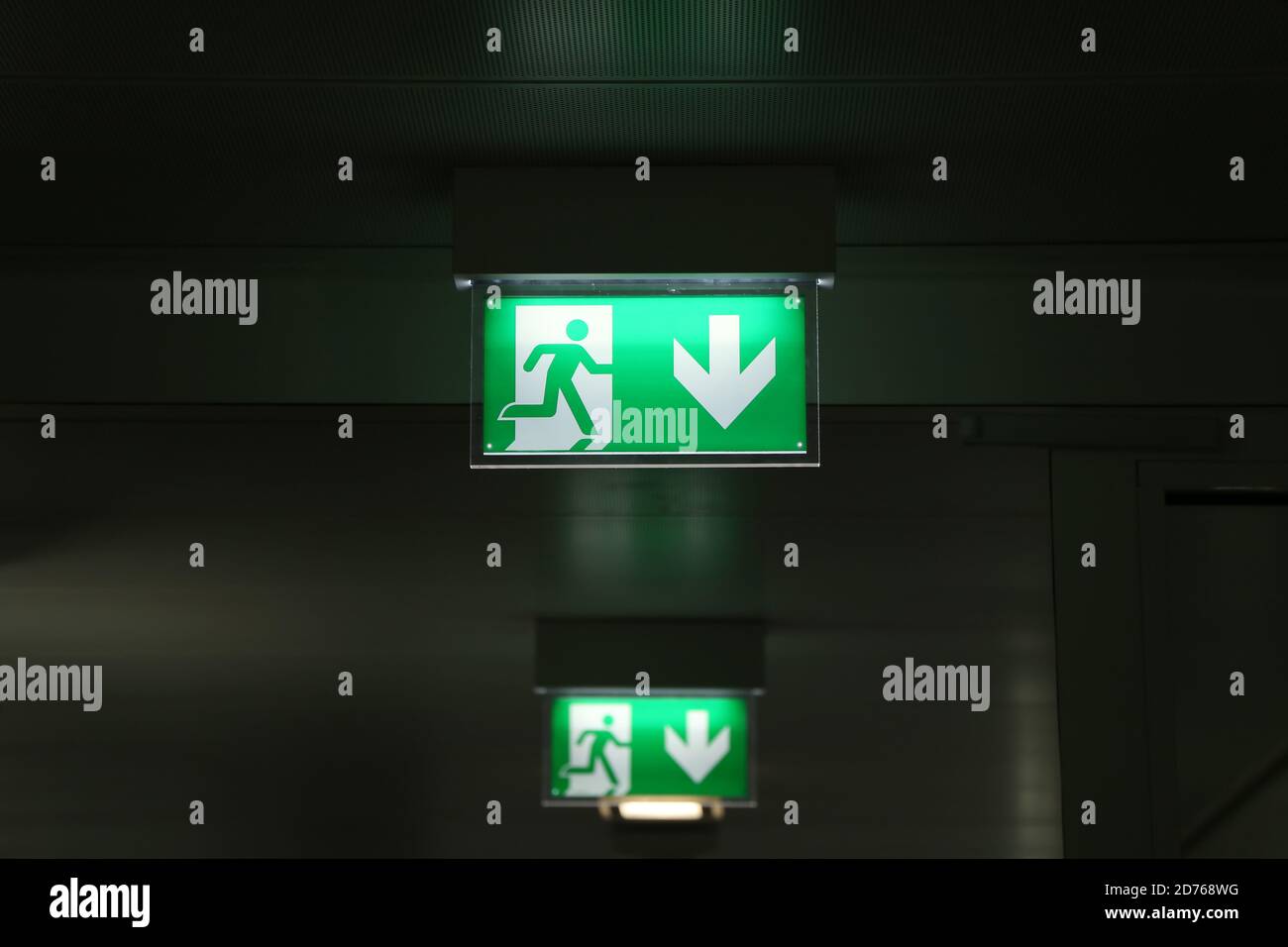 Closeup shot of an emergency exit sign Stock Photo - Alamy