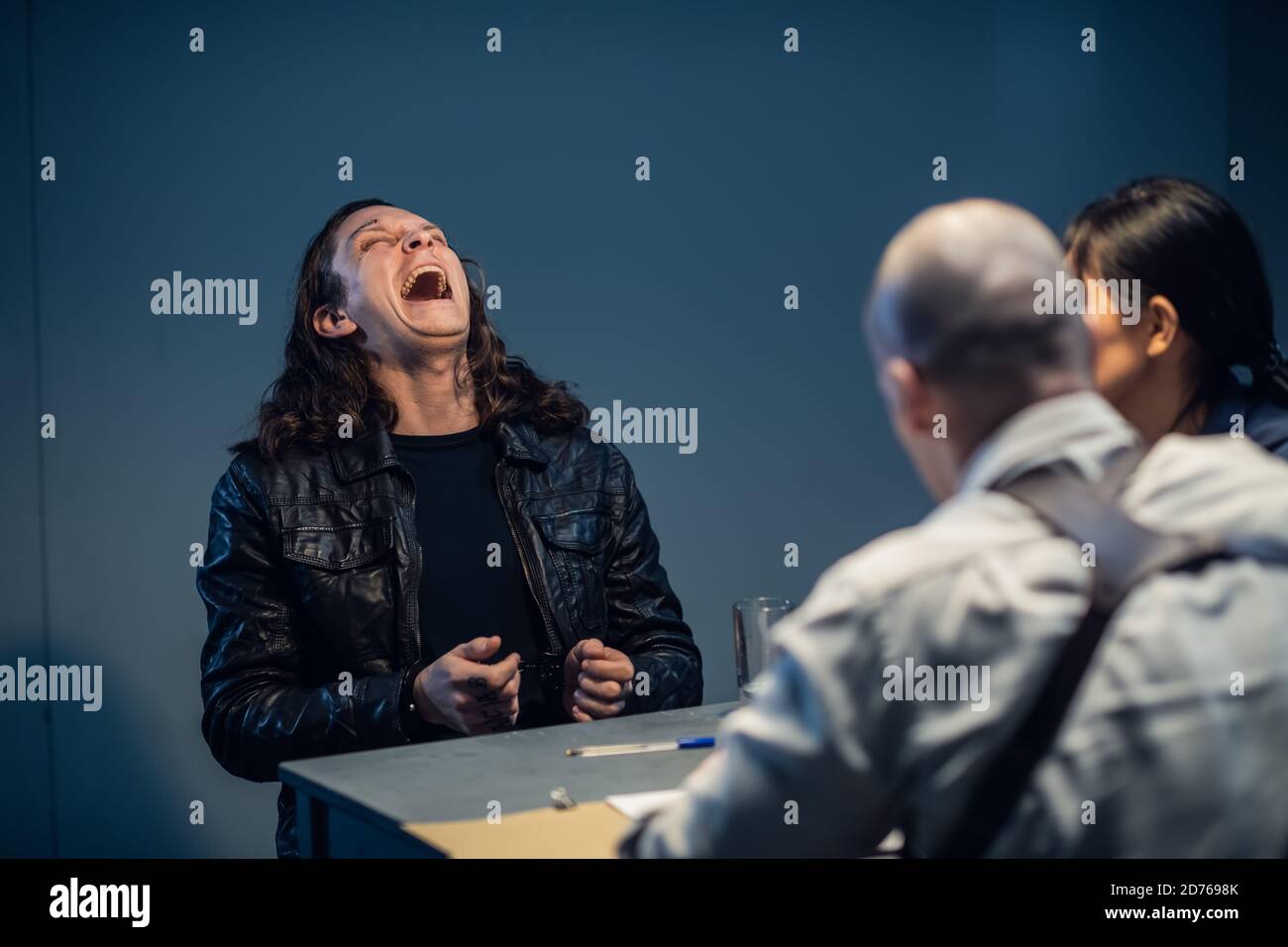 Interrogating witness at crime scene hi-res stock photography and ...