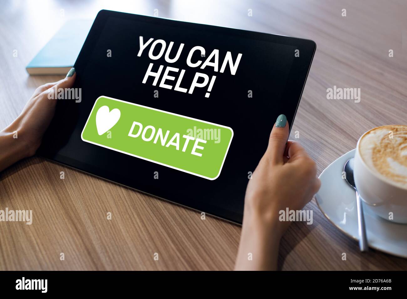 Help and donation button on device screen Stock Photo - Alamy
