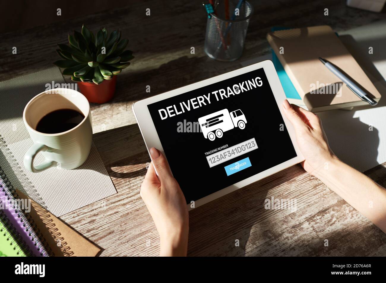 Delivery tracking form on device screen. E-commerce and business ...