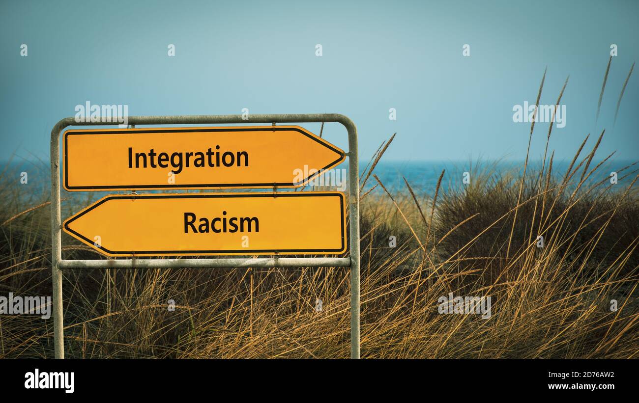 Street Sign the Direction Way to Integration versus Racism Stock Photo ...