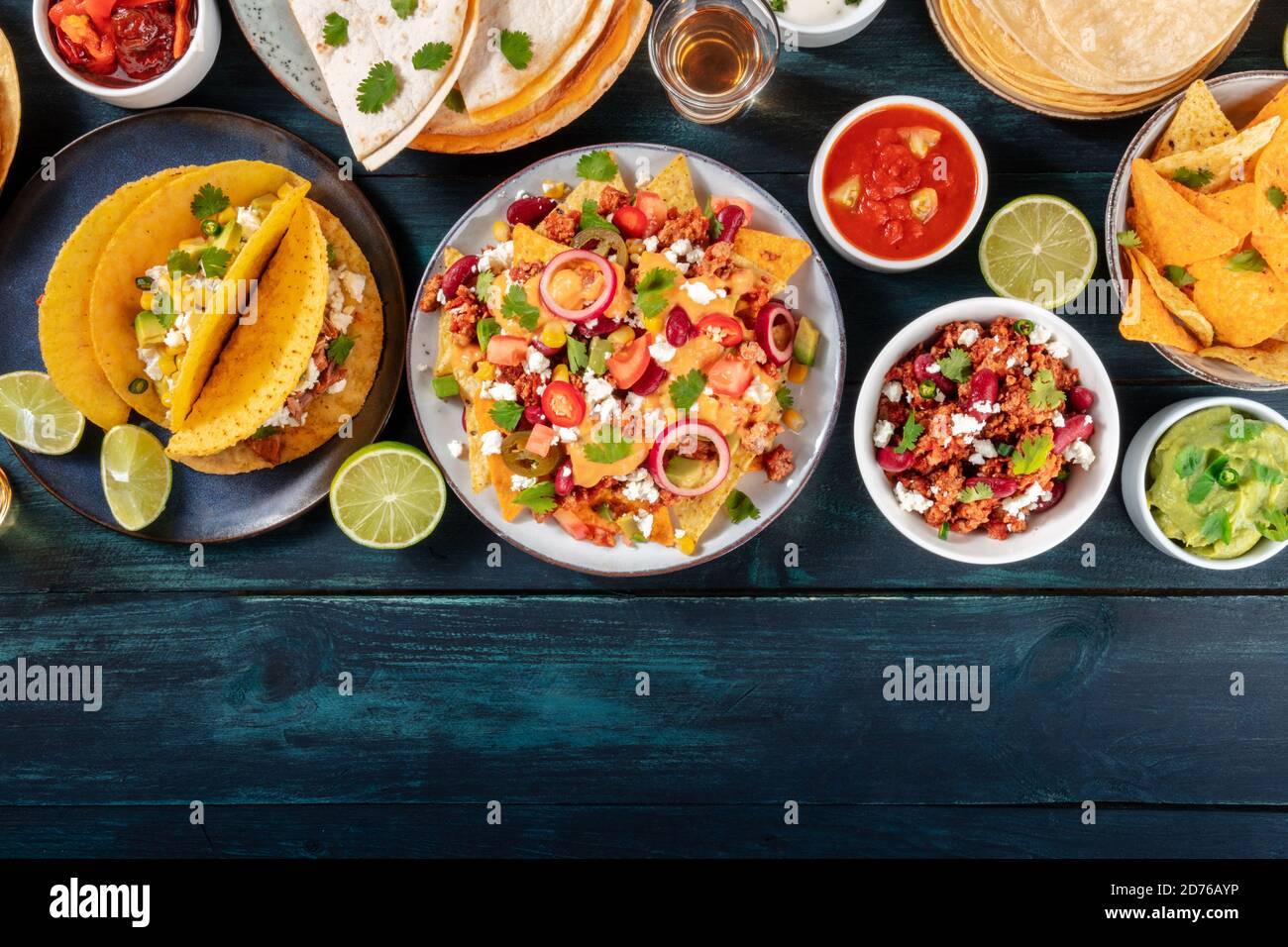 Mexican food background. A variety of dishes, shot from above on a dark ...