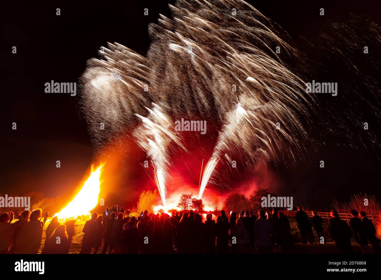 Spectacular and colourful firework display set against a dark Autumn ...