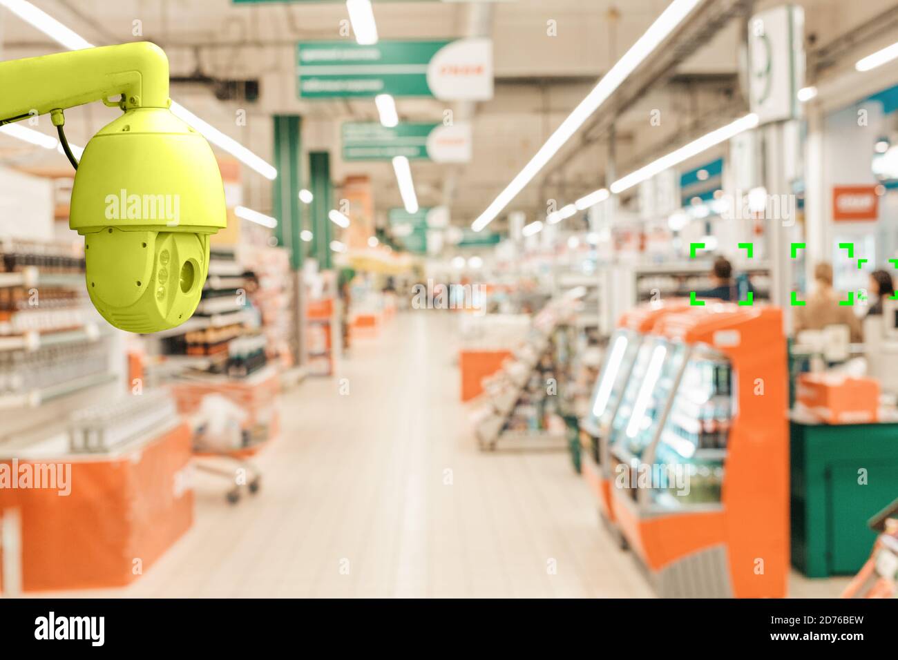CCTV. Yellow surveillance camera on the background of the trading floor ...