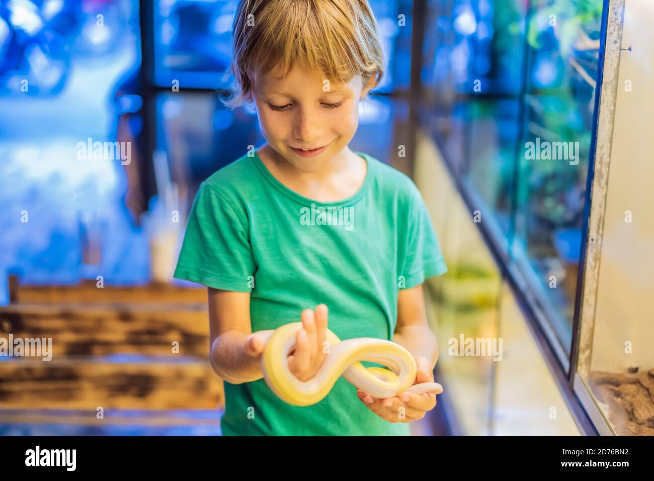 Boy With Python High Resolution Stock Photography and Images - Alamy