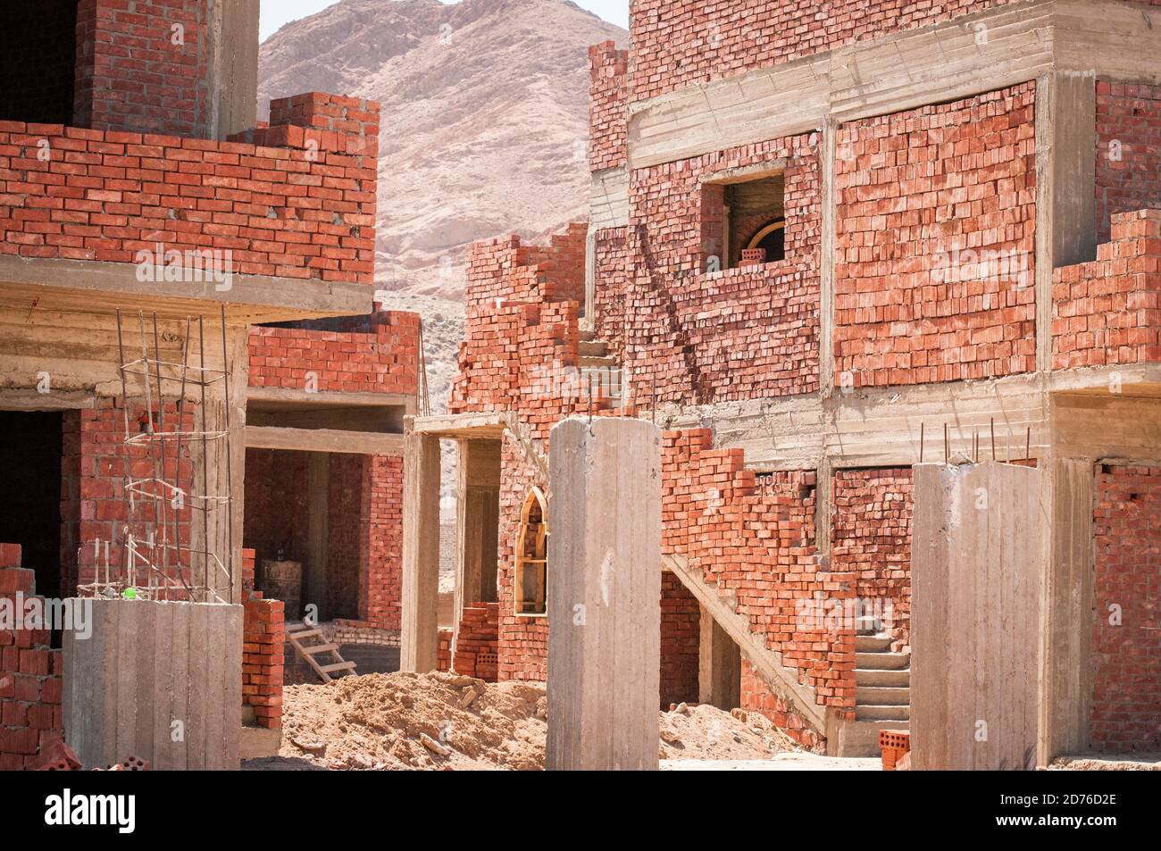 basic brick construction of house in North africa with window frames ...