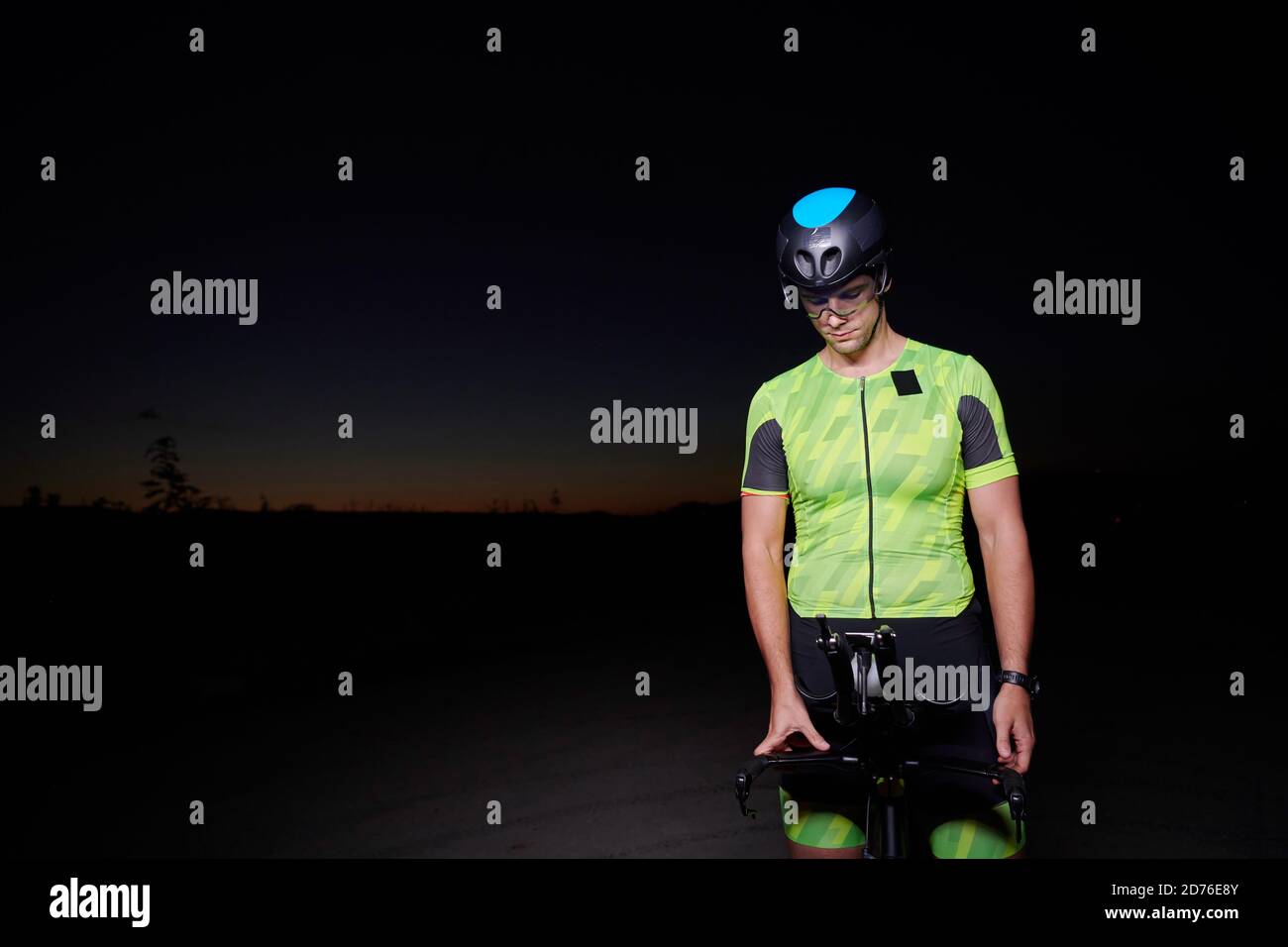 triathlon athlete portrait while resting on bike training Stock Photo ...