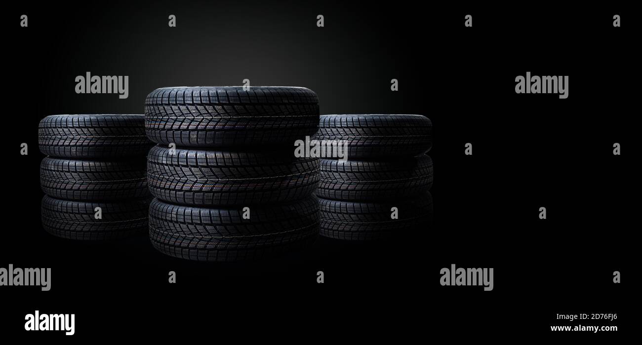 four black tires isolated on white background Stock Photo - Alamy